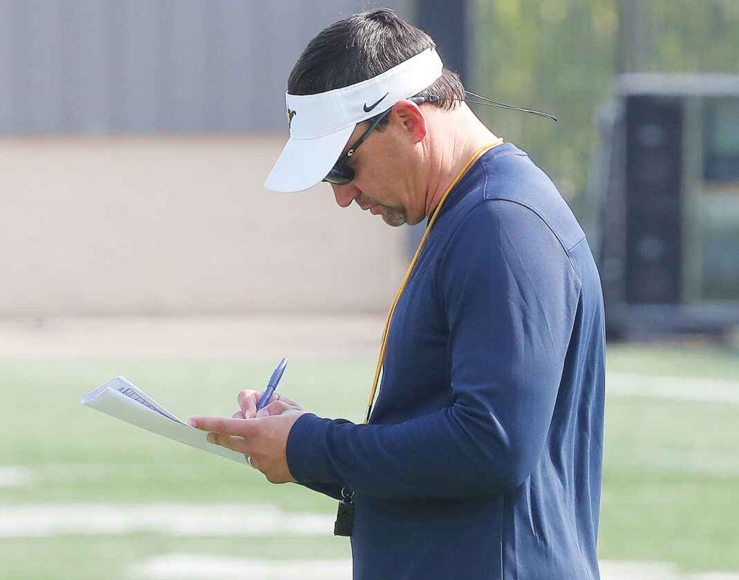 WVU head coach Neal Brown running the offense in pivotal season | News ...